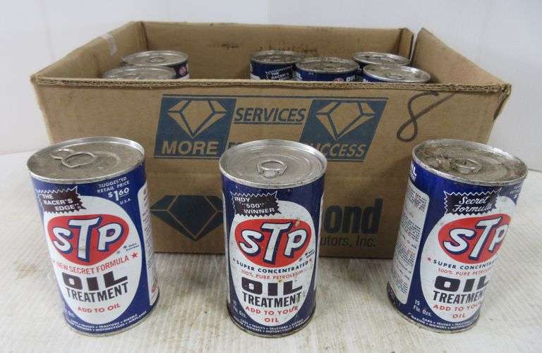 (13) STP metal oil cans, 15 oz., all are full - Albrecht Auction Service
