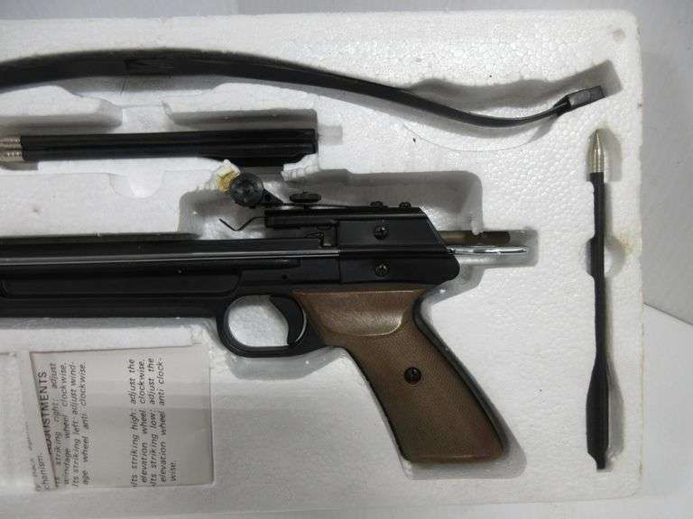 Pistol crossbow, die-cast gun body with (4) Arrow/darts, box is 18" x 9 ...