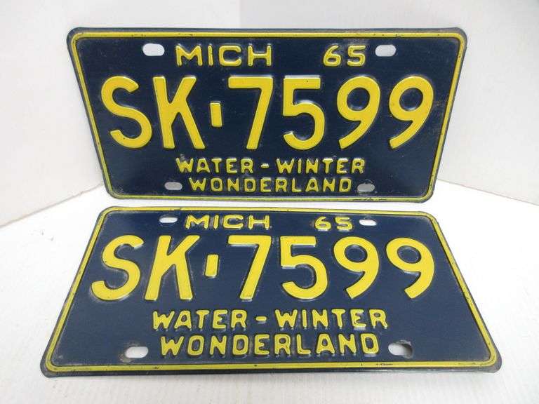 Matching pair of 1965 Michigan license plates, both- 12”W, in fair ...