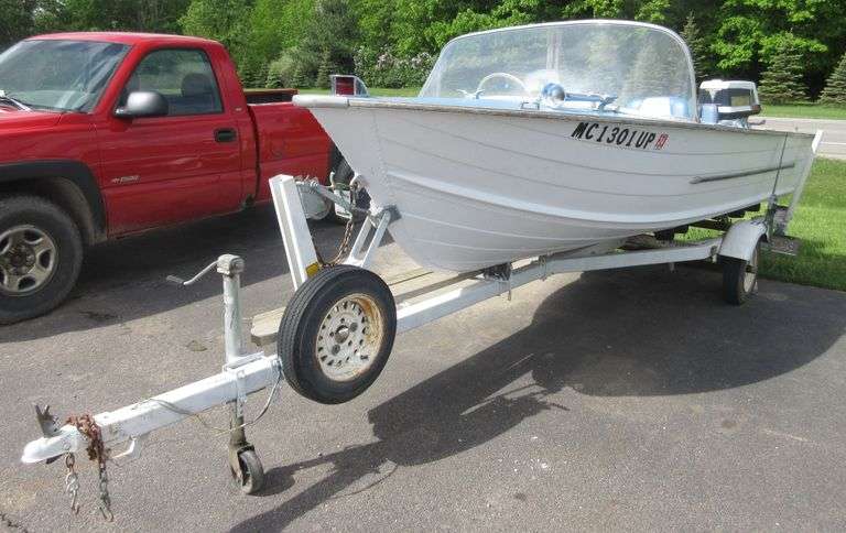 1976 Starcraft 15' boat and trailer, 1959 Evinrude 35 HP Golden Jubilee 50th anniversary motor ...