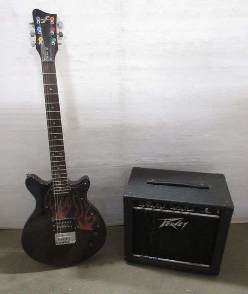 First Act electric guitar with a Peavey amplifier - Albrecht Auction ...