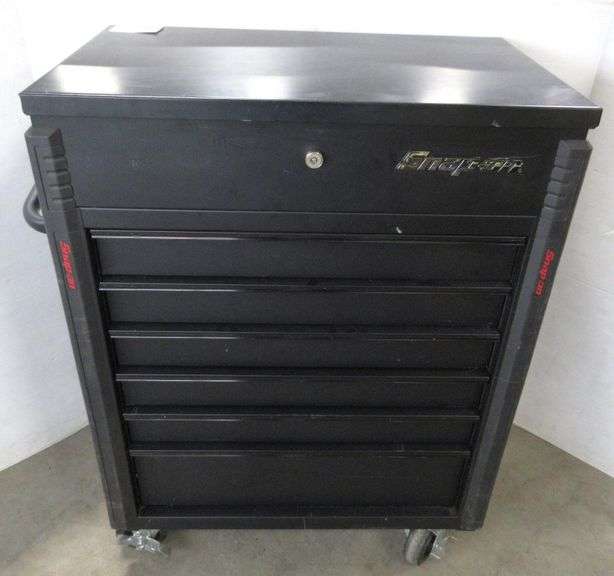 Black six-drawer Snap-On rolling tool box with hydraulic lift open top ...