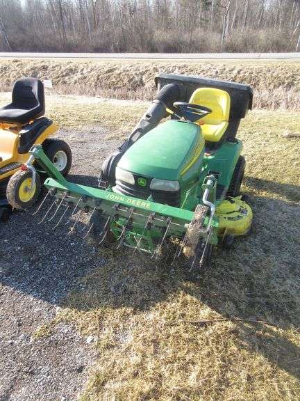 John Deere LT180 lawn mower with a 42" deck, rear bagger and front ...