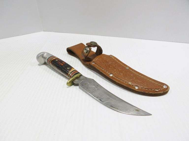 Western buck horn handle hunting knife with a heavy duty oak leaf ...