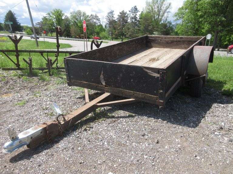 Older trailer built from a 1930s Ford frame, axle, and wheels, has a 2 ...