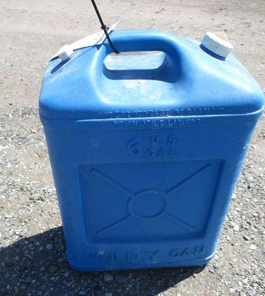 Blue six-gallon gas can, used - Albrecht Auction Service