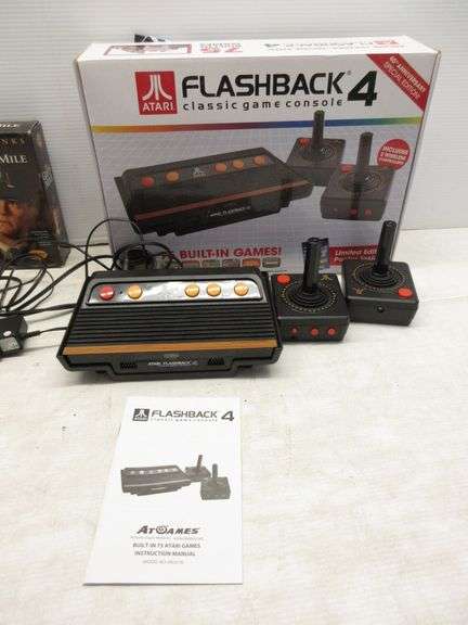 Atari game console flashback 4 and four VHS tapes - Albrecht Auction ...