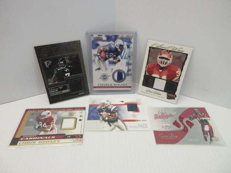 (6) Football game jersey relic cards in plastic sleeves, including ...