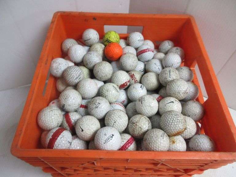 Crate of golf balls - Albrecht Auction Service