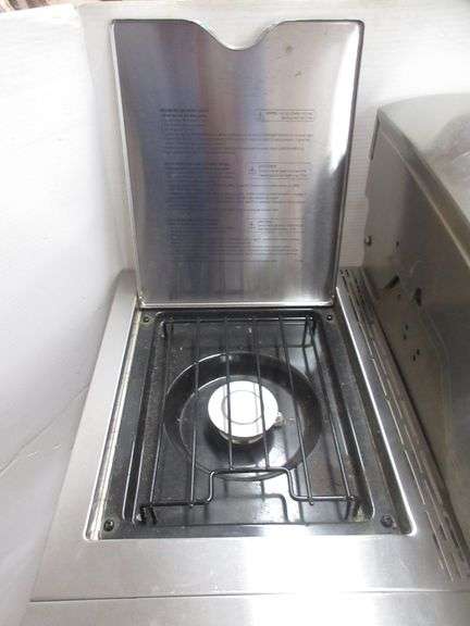 Char-Broil grill with four-burners and one side burner, comes with 20 ...