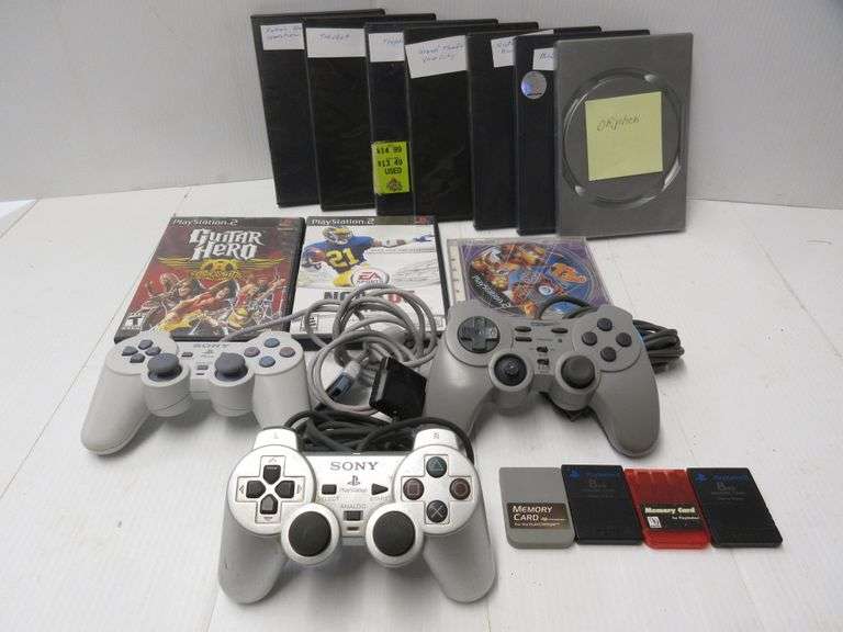 Interact controller, (2) Sony playstation controllers, (4) Memory cards ...