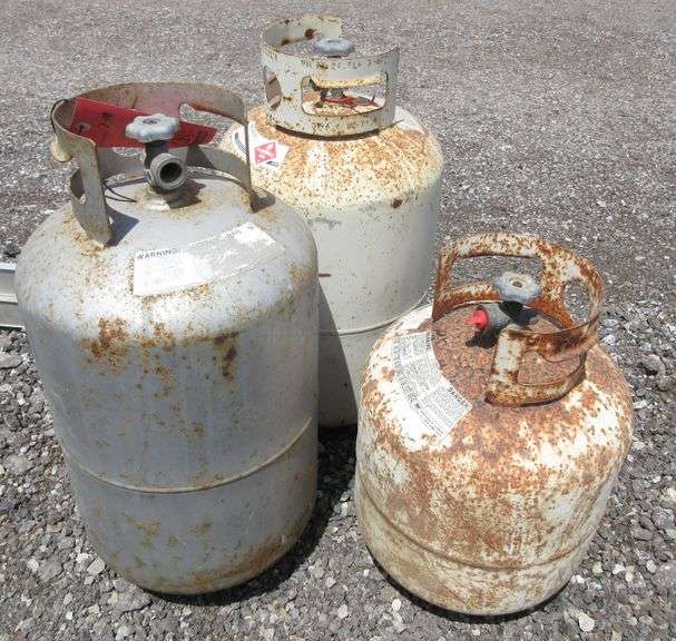 (3) Propane tanks: Two- 40 lb., almost full; One- 25 lb., used ...