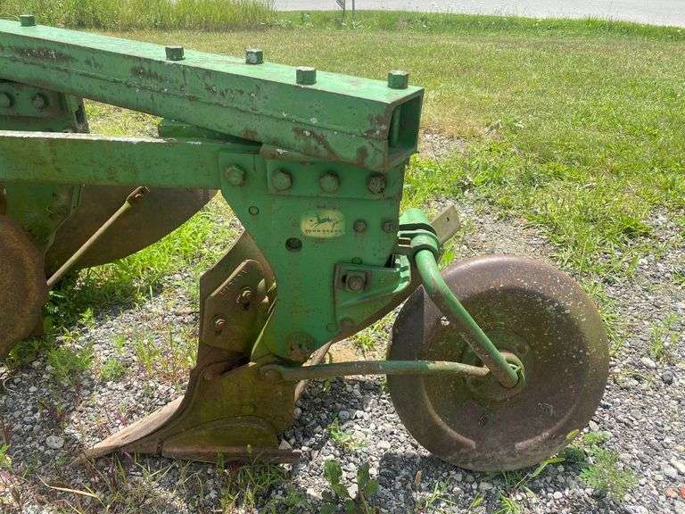 John Deere three-bottom plow with a Cat. II three-point hitch, tail ...