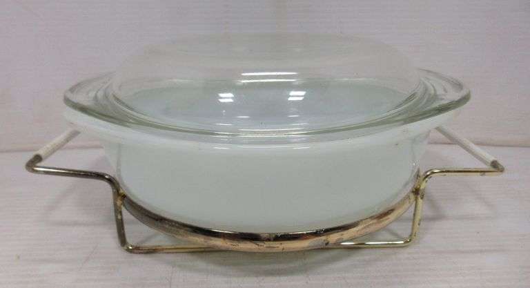 Older 1 1/2-quart white Pyrex dish with clear lid and gold stand with ...
