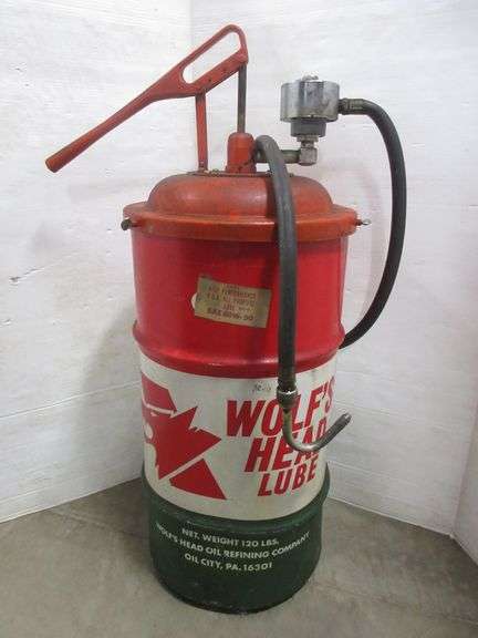 Wolf's head oil drum with original top pump, empty - Albrecht Auction ...