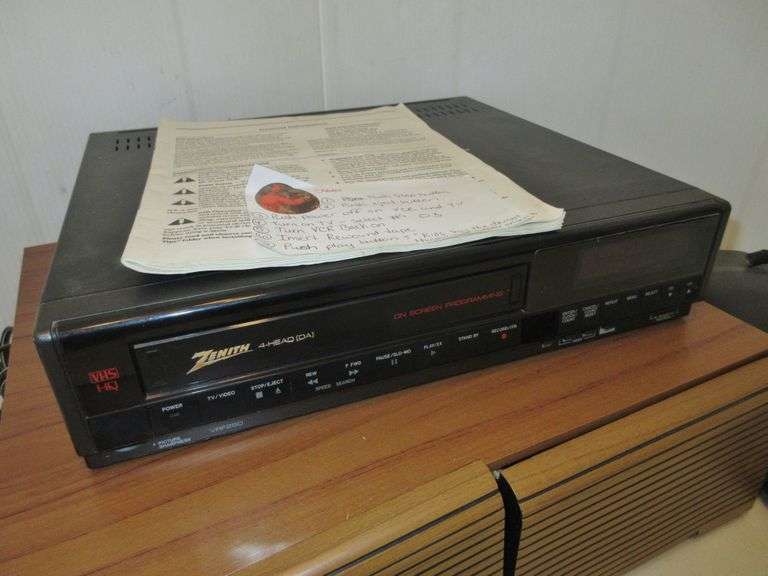 Zenith VHS Player, VHS Tapes, and a VHS Rewinder - Albrecht Auction Service