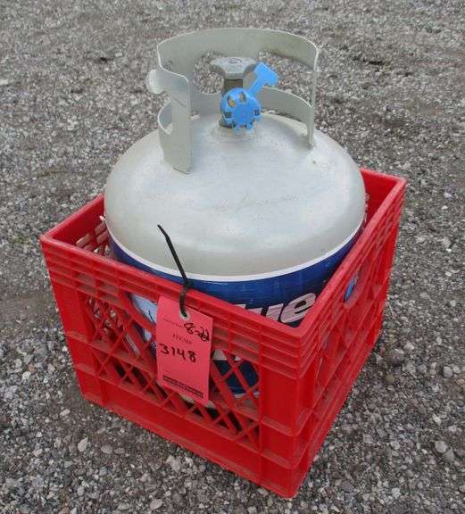15 lb. propane tank, new, completely full; Standard size milk crate ...