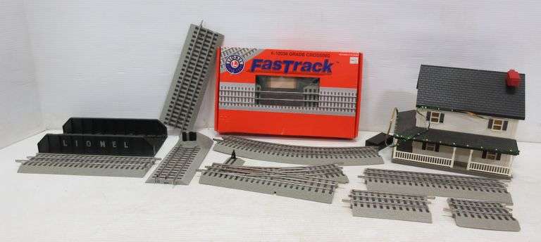 Lionel fast track, Lionel bridge, and an unmarked train house, all used ...