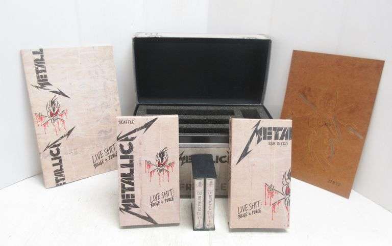 Metallica box with cassettes, VHS tapes, and a photo booklet, 11" x 6 ...