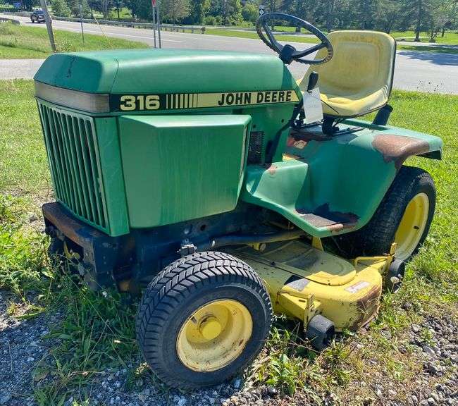 John Deere 316 lawn tractor, hydro transmission with mower, three tires ...