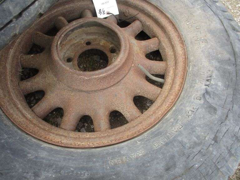 (2) Old truck rims, steel 7.00 x 17, wood 6.5 x 19, used, as is ...