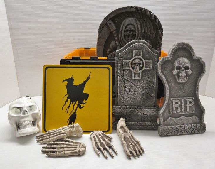 Halloween storage container with hinged lids, filled with items ...