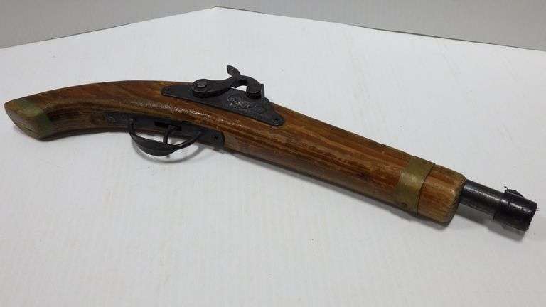 Faux wood handle cap gun, made by Hurley Flintlock, fair; Wood cap gun ...