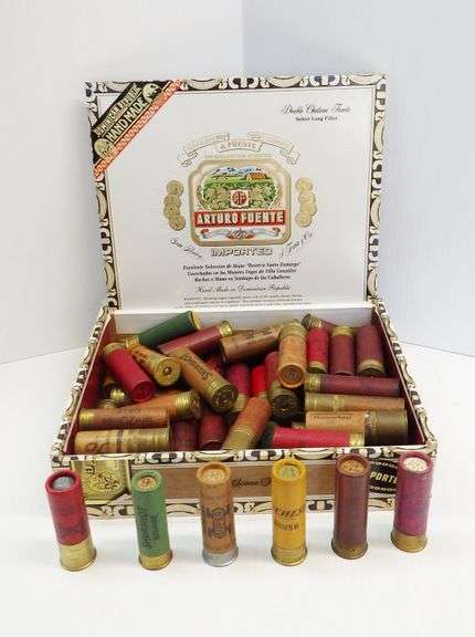 Cigar box filled with older shotgun shells, different makes, gauges ...