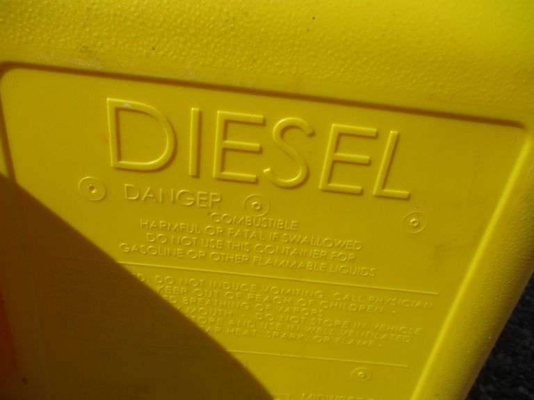 Pair of 5-Gallon diesel fuel cans, yellow in color, in excellent ...