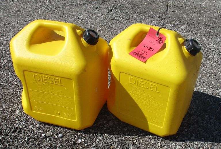 Pair of 5-Gallon diesel fuel cans, yellow in color, in excellent ...
