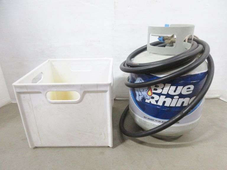 Propane tank, new and full; Standard milk crate for transport; Propane ...