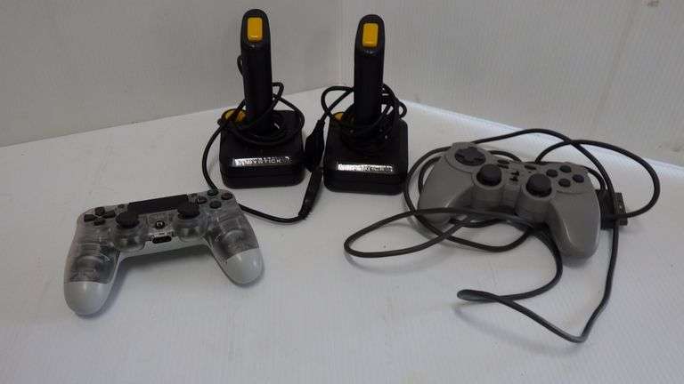 Video game controllers, include: 2- Sinclair ZX spectrum joysticks; 1 ...