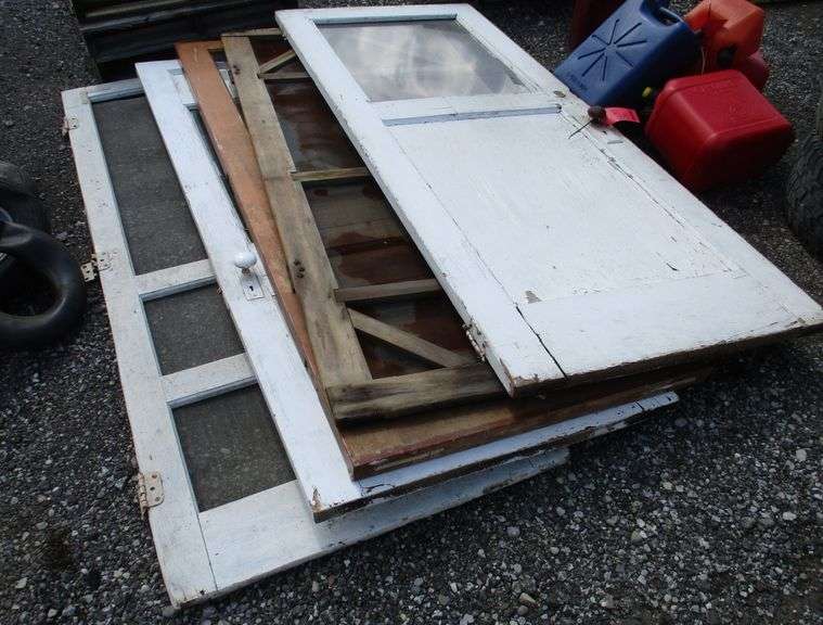 (3) Antique wood doors, with glass and (2) antique screen doors, shows ...