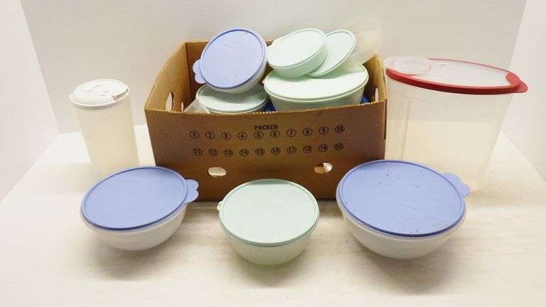 Various tupperware with lids, some Sterilite containers with lids ...