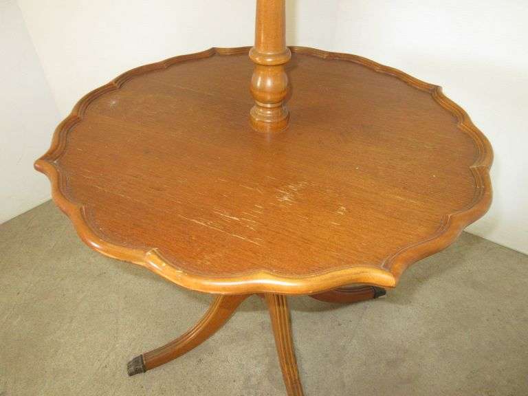 Three-tiered pie shaped table, 38"H, light wear - Albrecht Auction Service