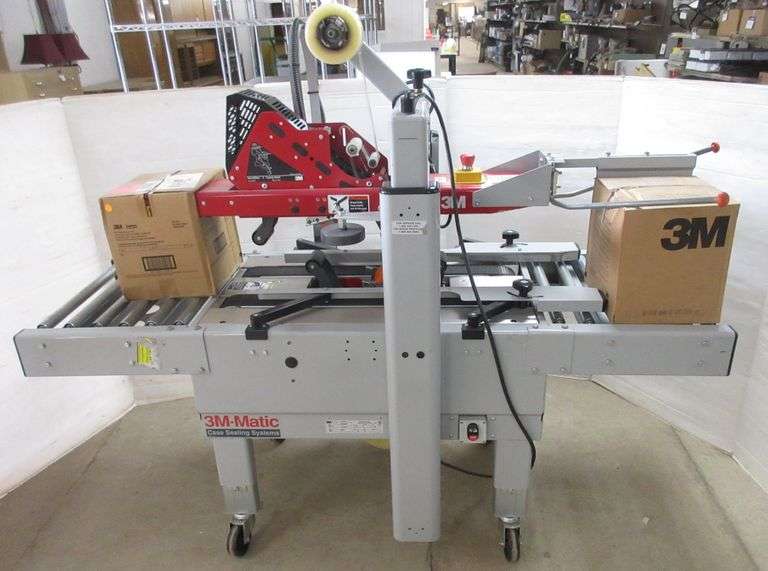 3M tape sealing machine, tapes top and bottom of carton, works ...