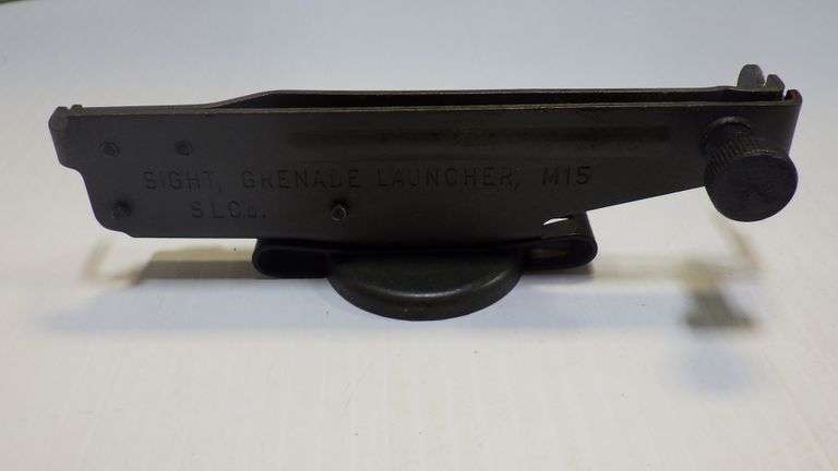 (3) Decommissioned grenade launchers with deactivated grenades ...