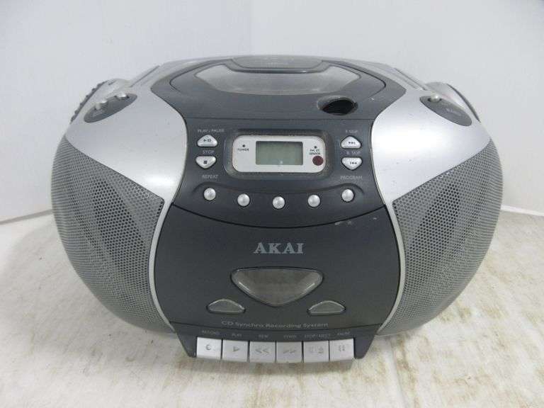 AKAI boombox, radio and CD player work, cassette is untested, as is ...