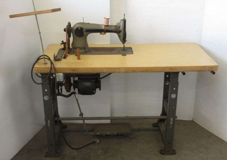 Singer 31-15 commercial sewing machine on commercial table with newer ...