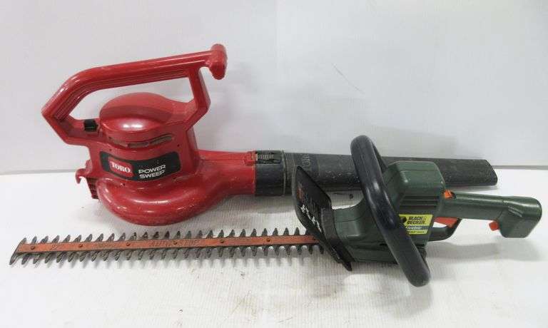 Toro Power Sweep electric leaf blower, and a Black & Decker electric ...