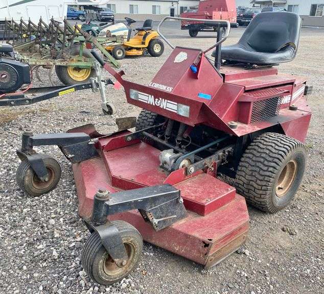 M&W mower, 18 HP, 60" deck, includes owner's manual, extra parts, and ...