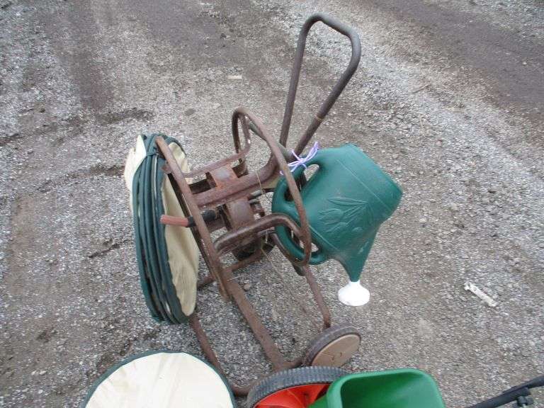 Scotts fertilizer spreader, (2) Collapsible waste containers, Hose reel ...