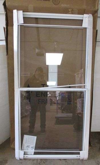 Larson exterior storm window, 32" x 66" - Albrecht Auction Service
