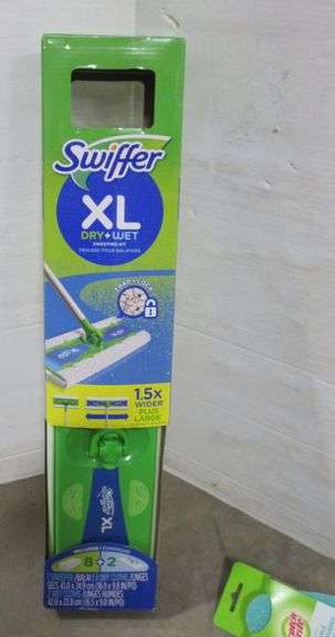 Various cleaning items, includes: Swiffer duster with refill ...