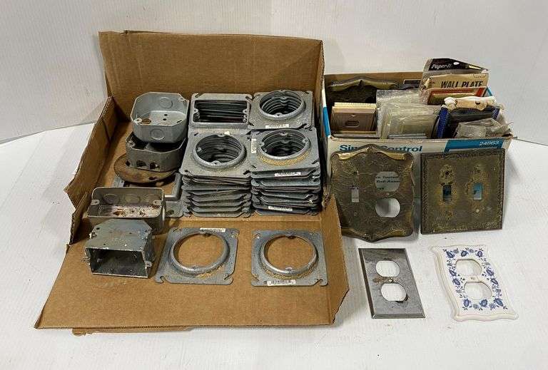 Assorted switch box covers, old and new; Assorted steel box mud covers ...