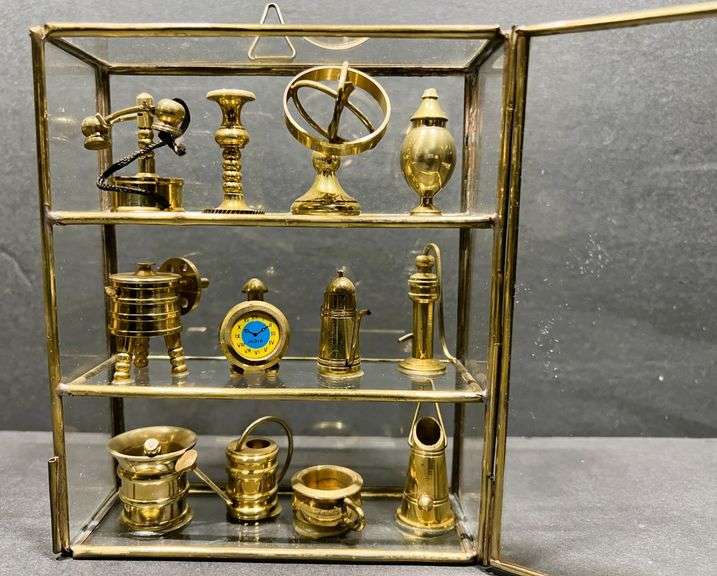 1980's Solid brass miniatures in a brass trimmed glass display case ...