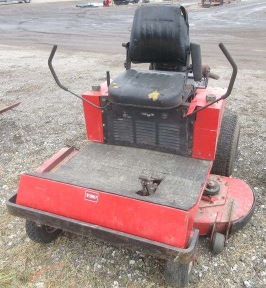 Older Toro 24 zero turn mower, 60" deck, turn key on then hit switch to ...