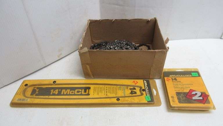 McCulloch chainsaw bar, new; Chain in package, new; (7) Used chains ...