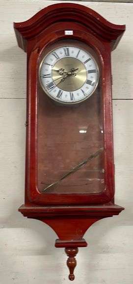 Stratford wall clock with pendulum, 9"W x 24"H - Albrecht Auction Service