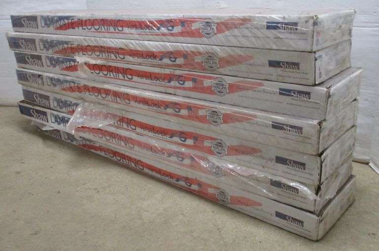 (7) Boxes of Shaw laminate flooring, Color .00644 Dark oak, one box is ...